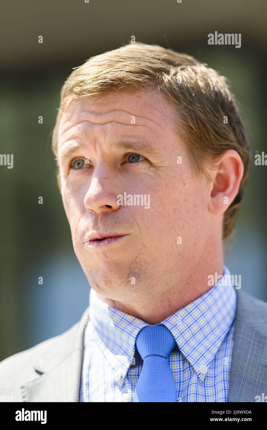 Sam Tierney from Ken Cush and Associates speaks outside the ACT ...