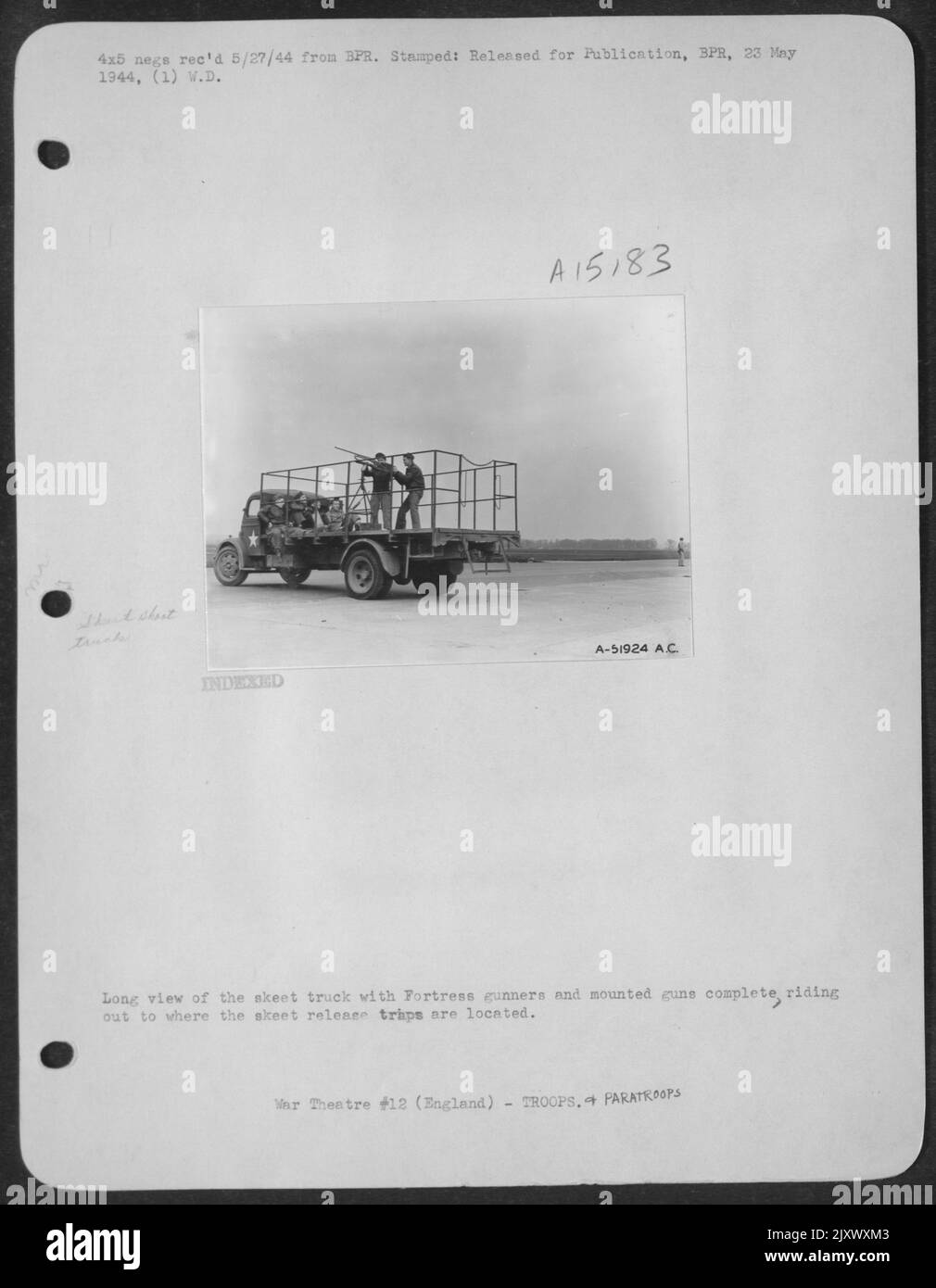 Long view of the skeet truck with ofrtress gunners and mounted guns ...