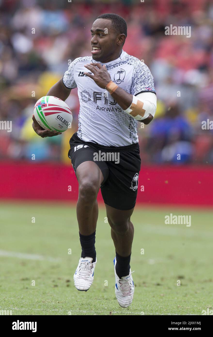 Waisea Nacuqu of Fiji scores during the Sydney 7's rugby pool match ...