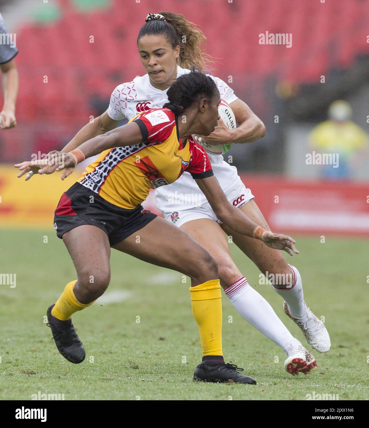 Deborah Fleming of England is tackled during the Sydney 7's WomenÕs ...