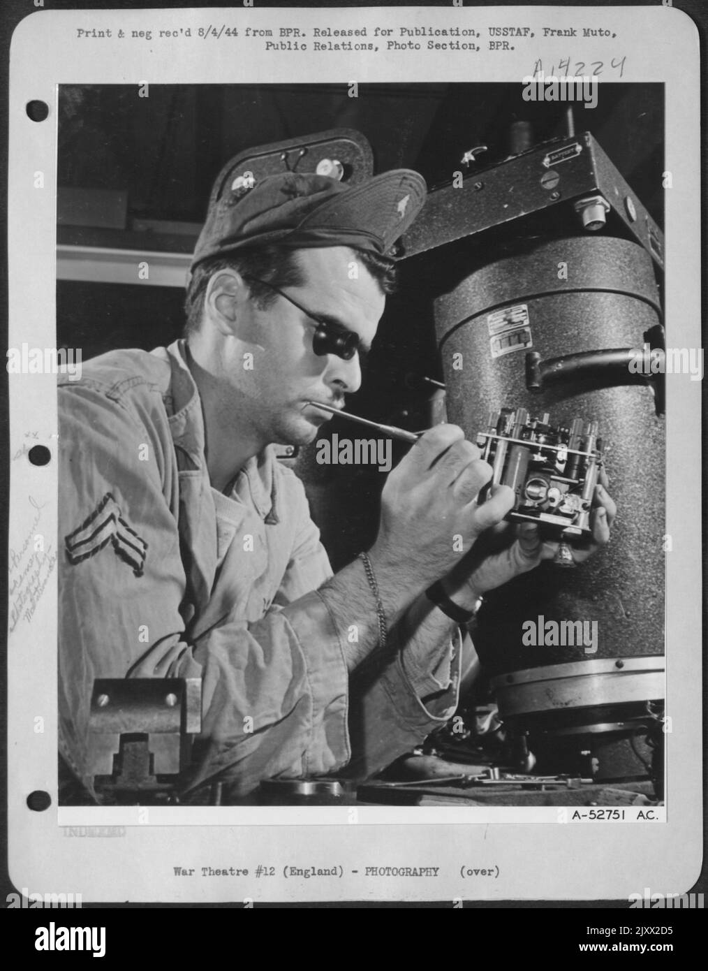 The operation of the large aerial camera at the right is controlled by ...