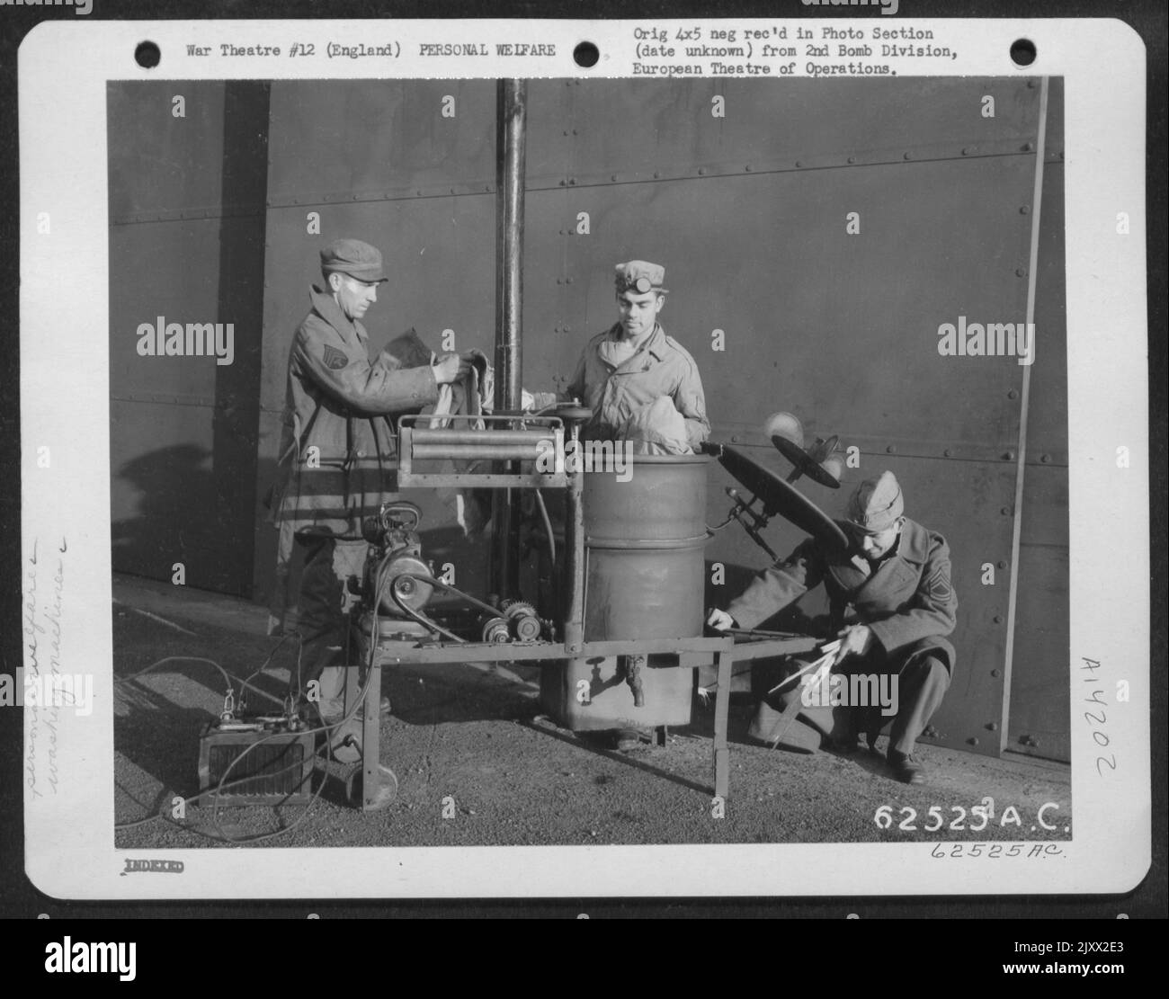 Military personnel assist in Black and White Stock Photos & Images - Alamy