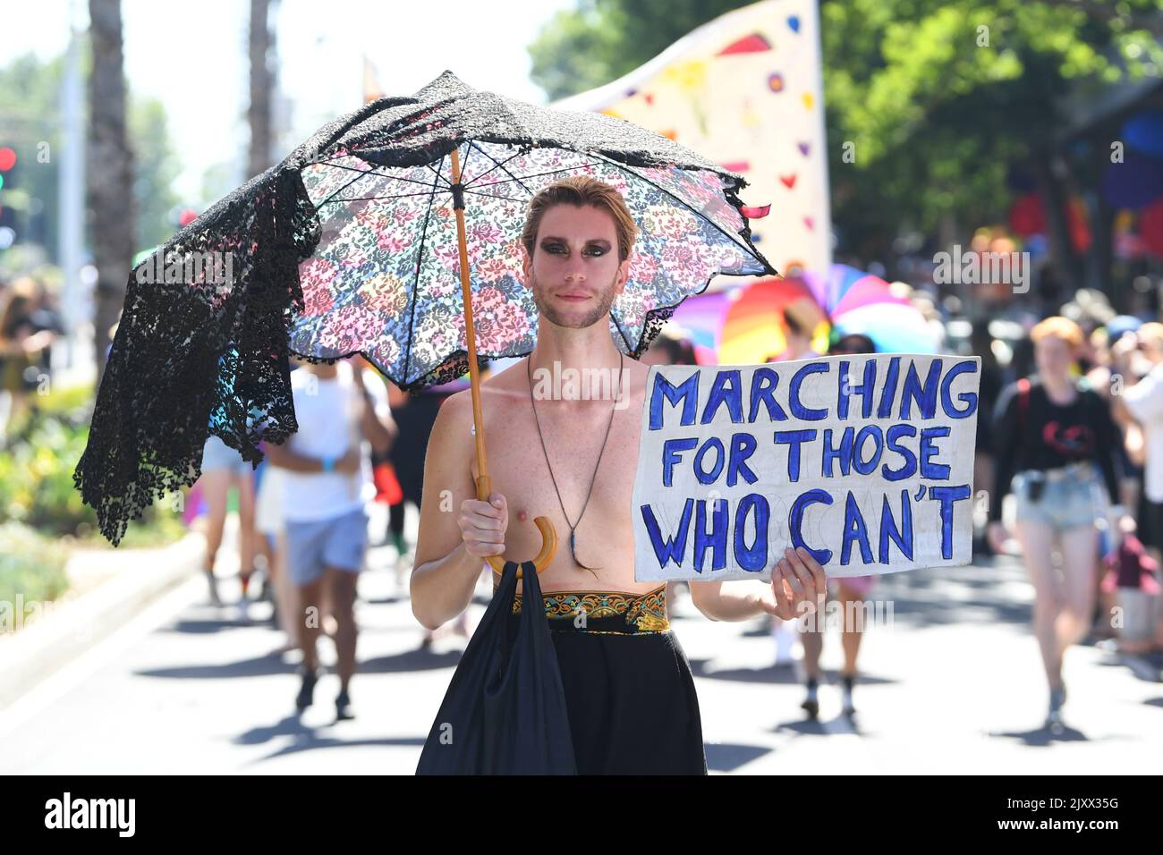 Attendees of the Midsumma Pride March are seen along Fitzroy street in ...