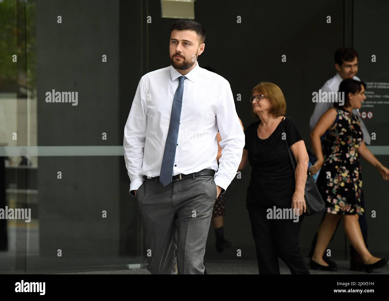 Edgar "Ned" Riggs leaves the Supreme Court in Brisbane after giving ...