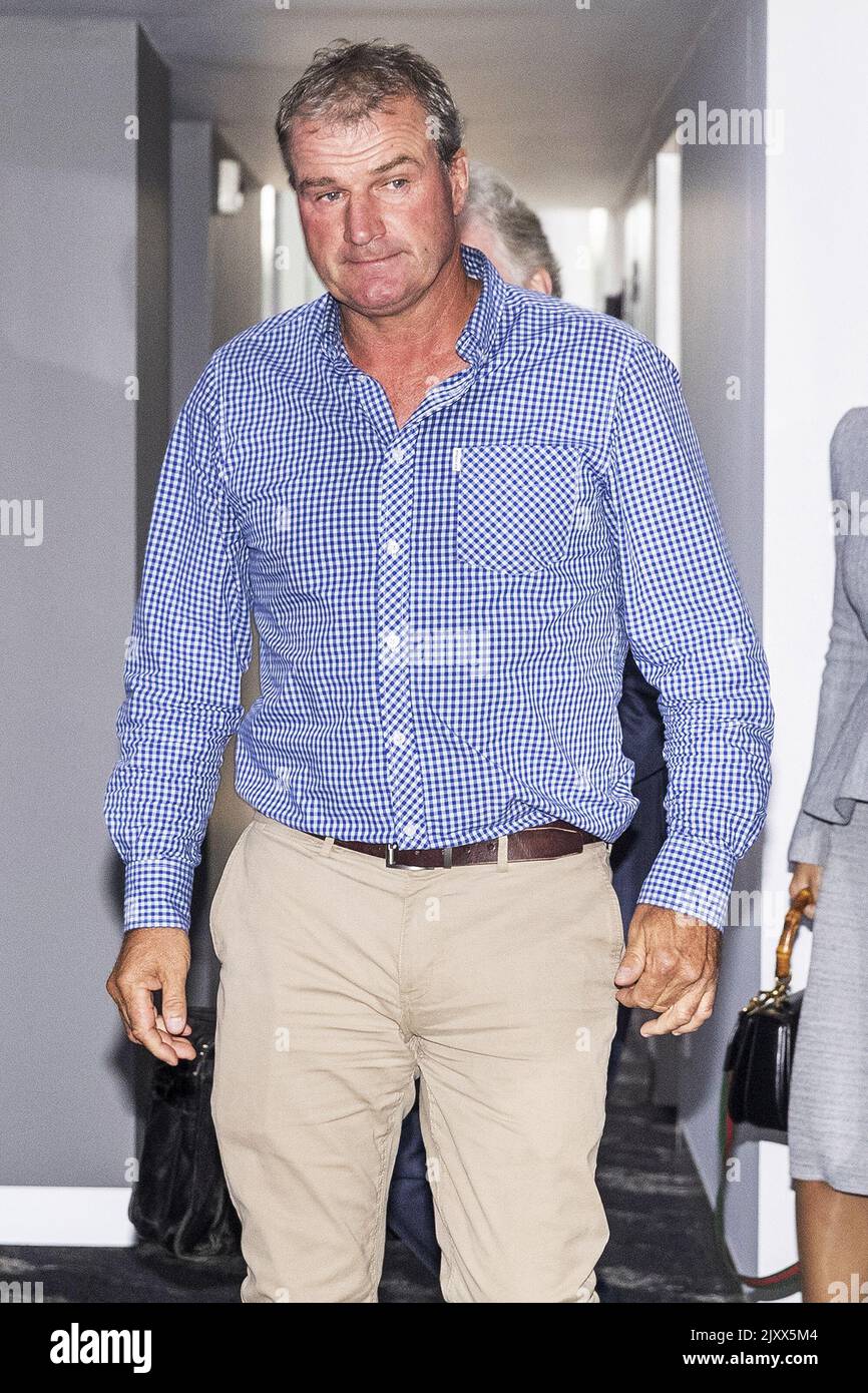 Darren Weir is seen leaving Victorian Racing Club's headquarters ...