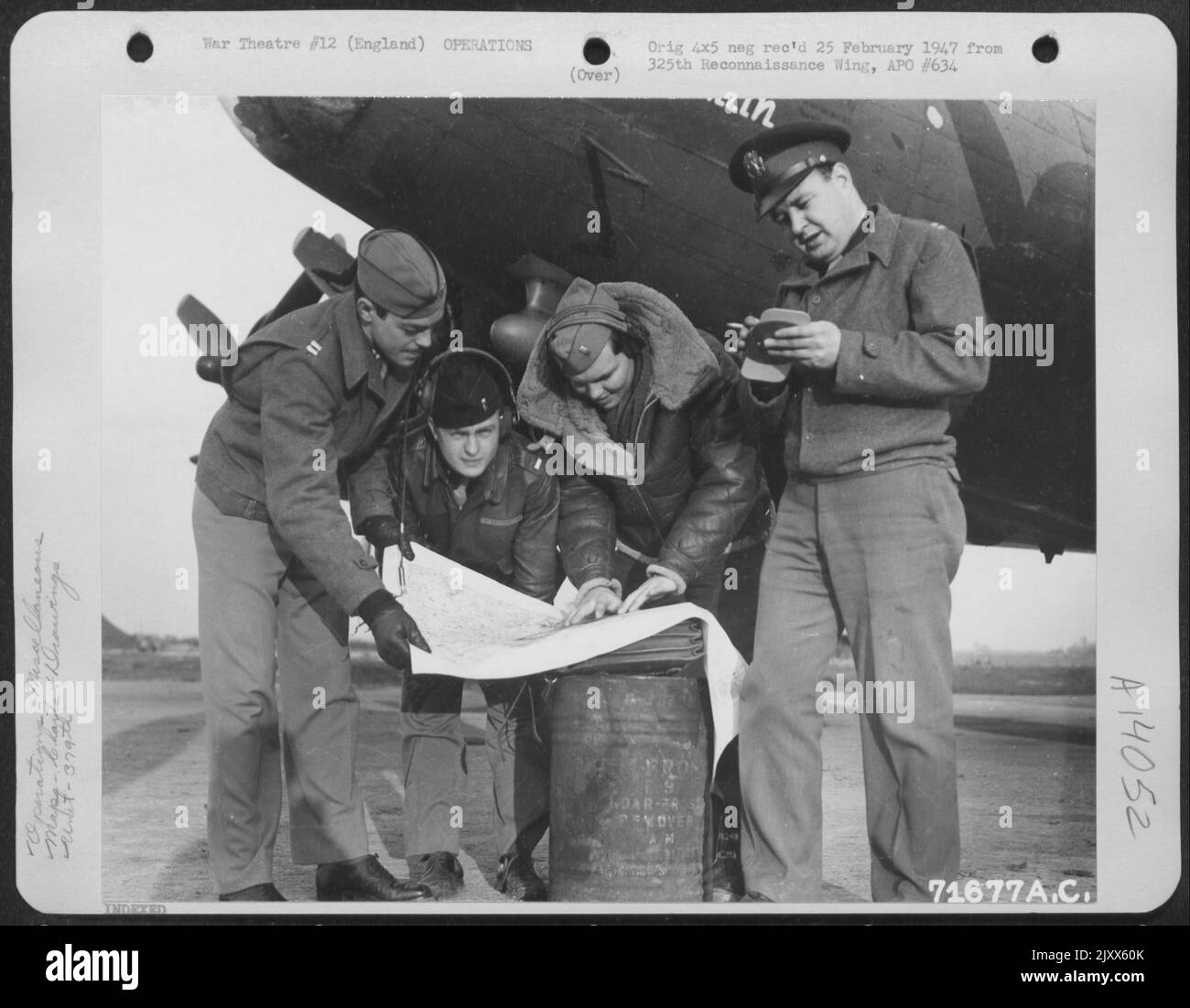 Crew Members Of The 379Th Bomb Group Study A Map Of The Target Area ...
