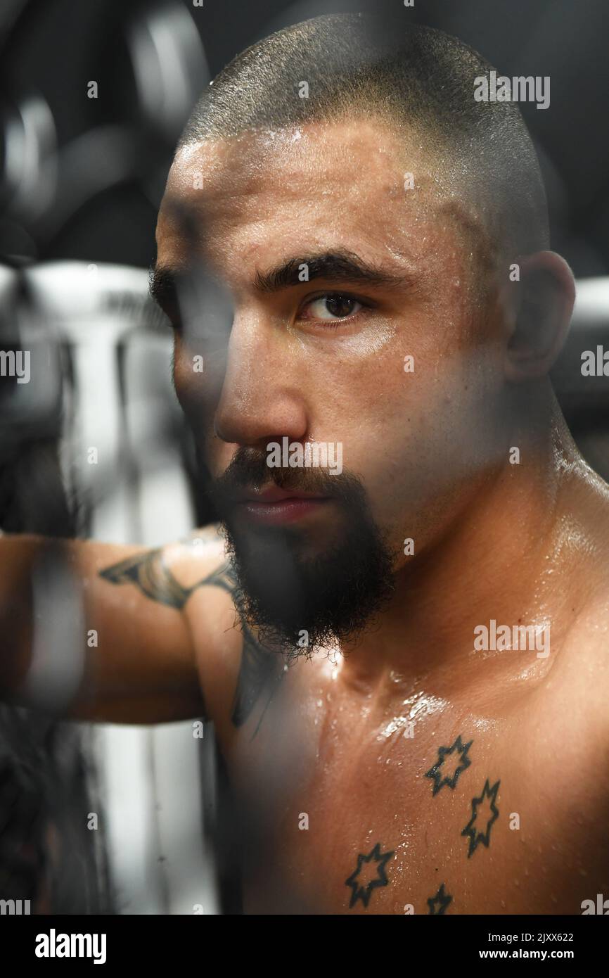 Robert Whittaker poses for a photograph following the UFC 234 card open ...
