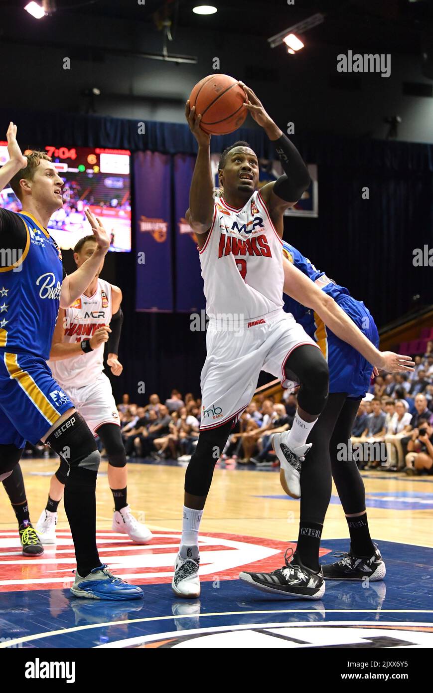 Cedric Jackson (centre) of the Hawks in action during the Round 17 NBL ...