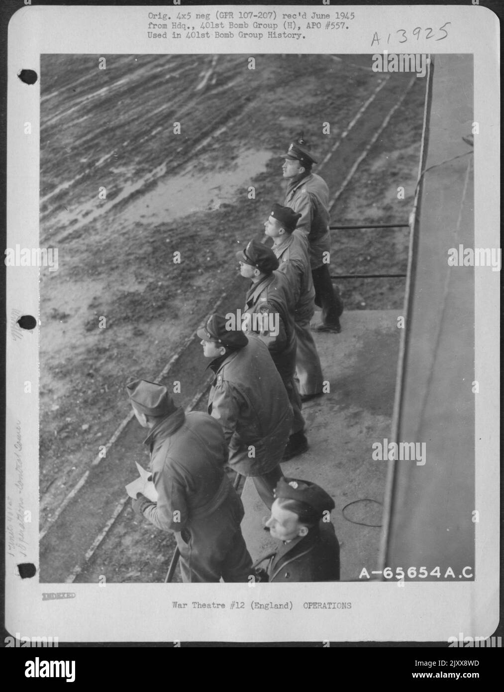 Officers Of A 401St Bomb Group Peer Into The Skies To Count Planes ...