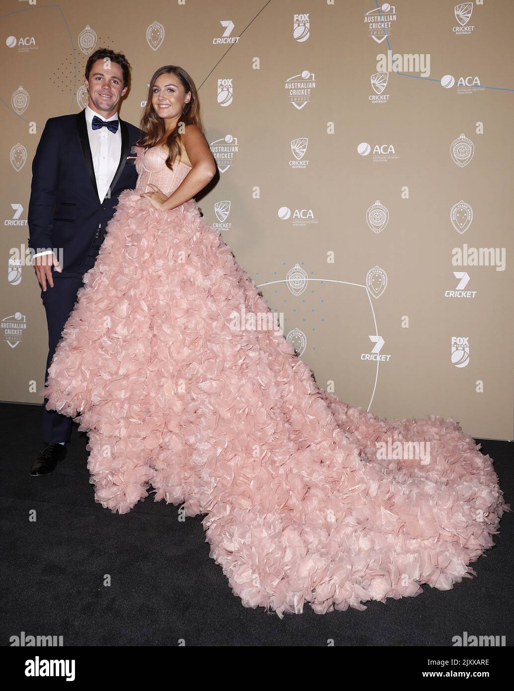 Travis Head and Jessica Davies pose for a photograph on arrival for the ...