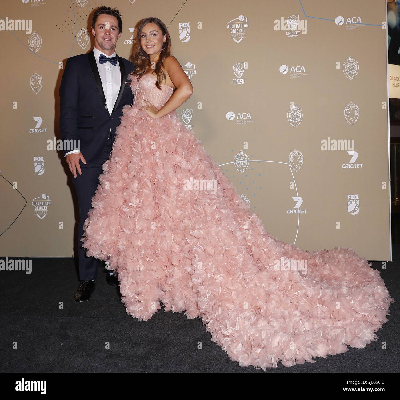 Travis Head and Jessica Davies pose for a photograph on arrival for the ...