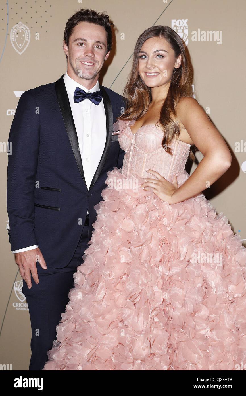 Travis Head and Jessica Davies pose for a photograph on arrival for the ...