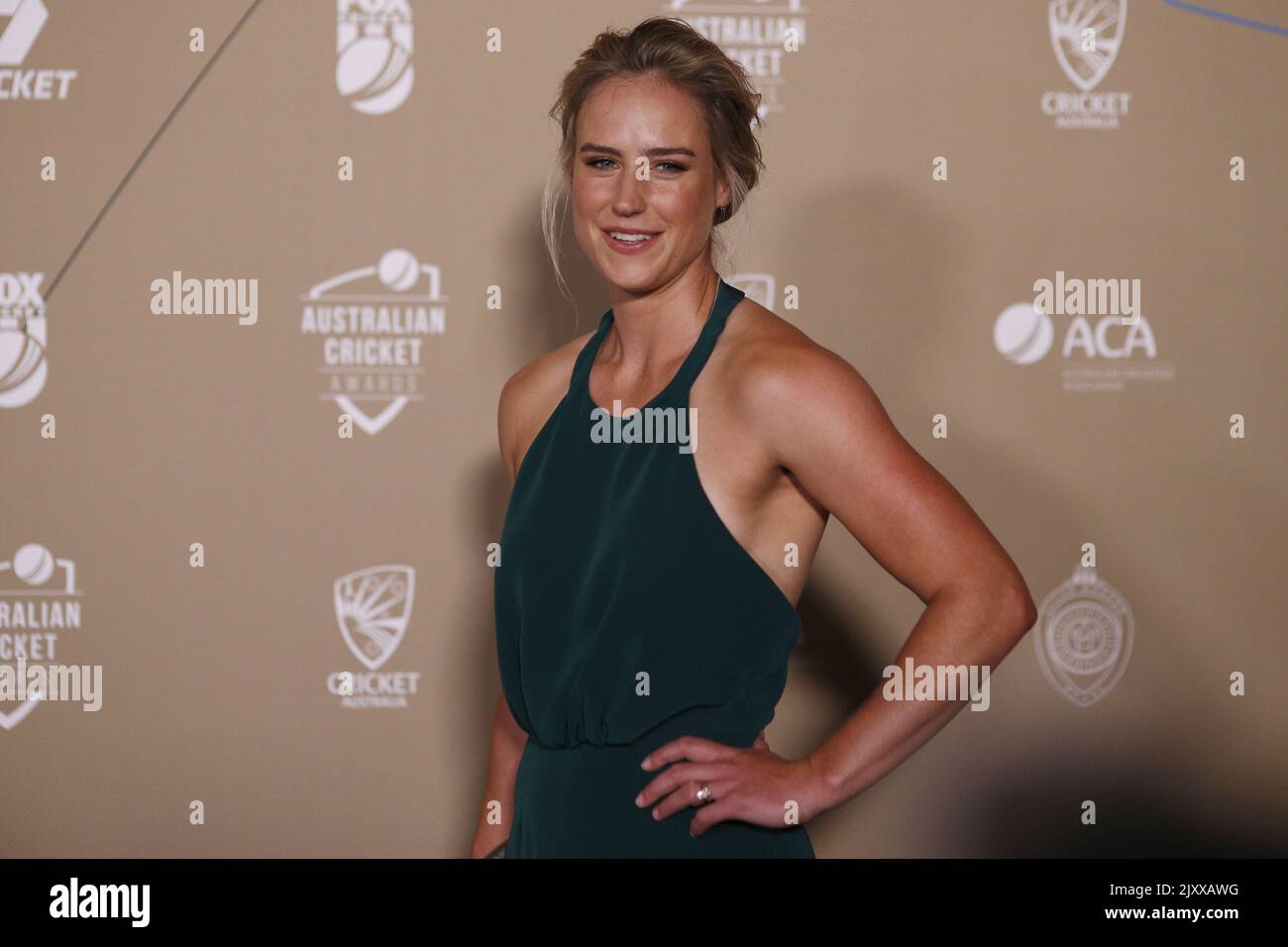 Ellyse Perry poses for a photograph on arrival for the Australian ...