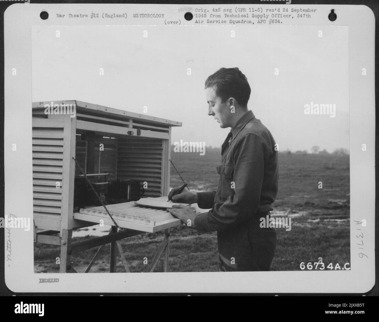 An Enlisted Man Of The Weather Section Checks Observes And Records ...