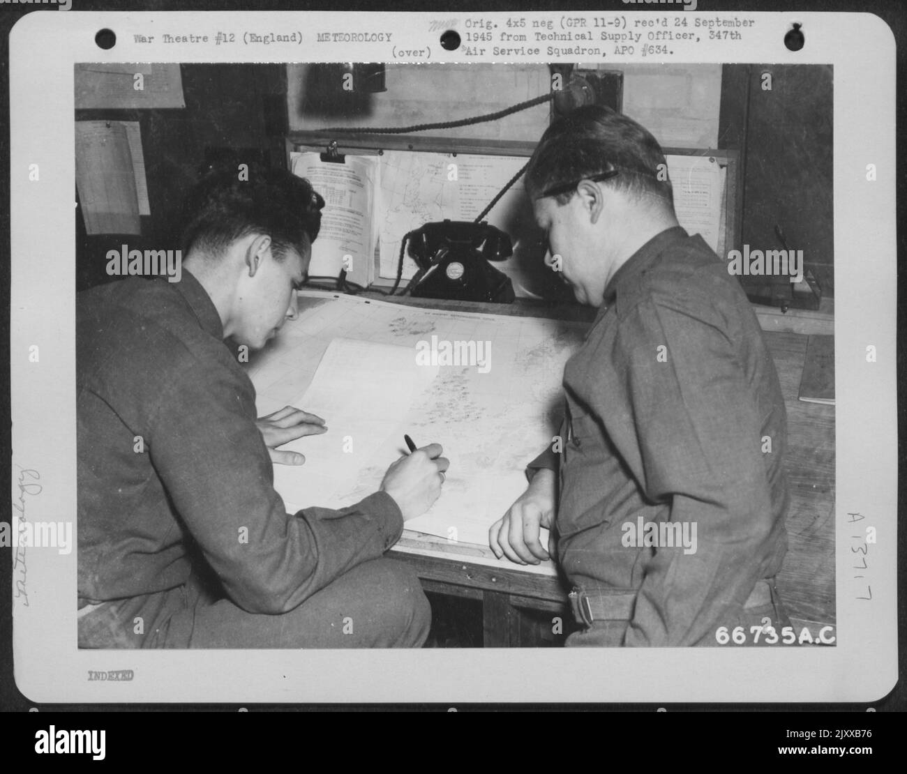 Meterology Experts Prepare Weather Map In The Weather Section Of The ...