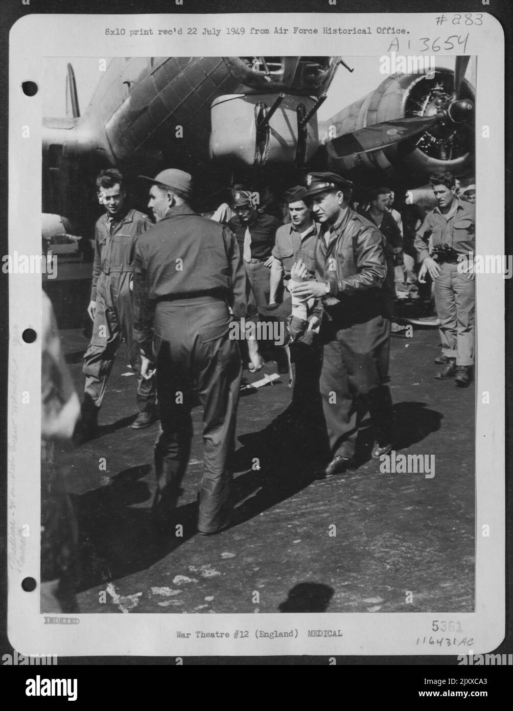 England - As His Buddies Look On In Sympathy, This Wounded Crew Member ...