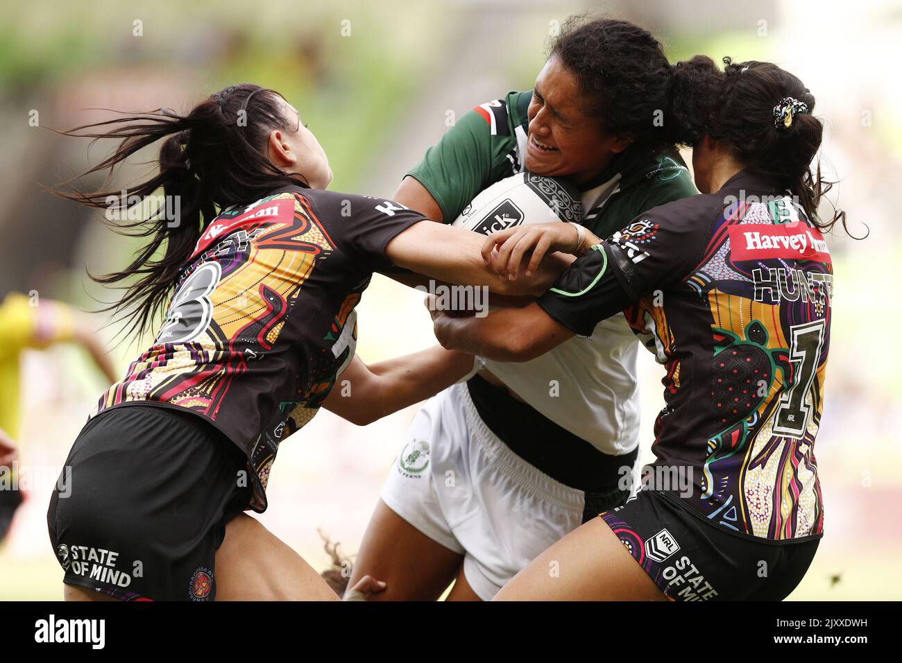 Zahara Temara of the New Zealand Maori Ferns is tackled by Amber Pilley ...