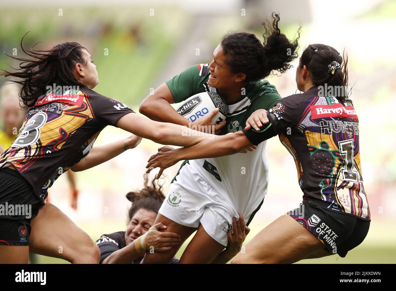 Zahara Temara of the New Zealand Maori Ferns is tackled by Amber Pilley ...