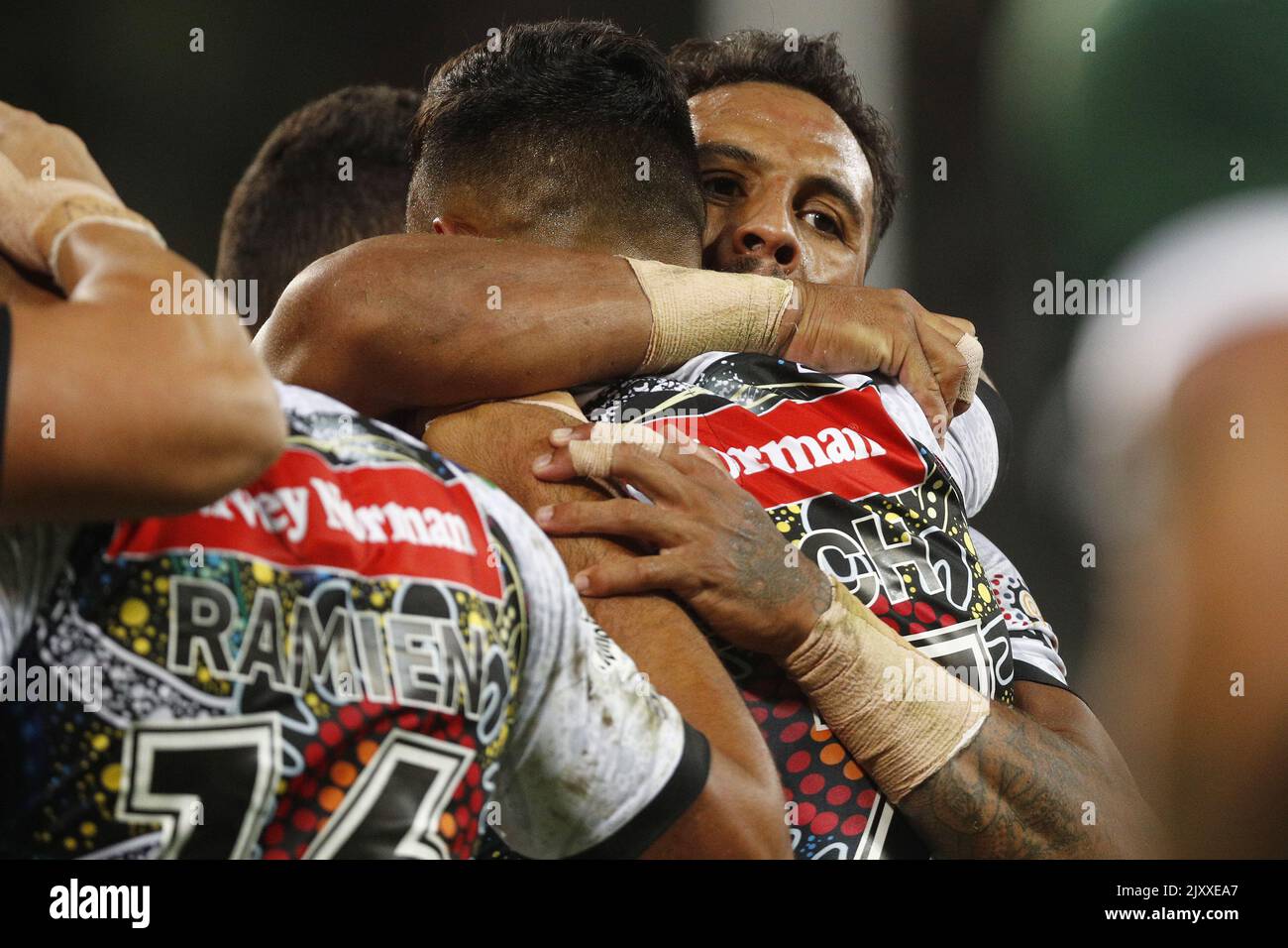 Josh Addo-Carr of the Indigenous All Stars (right) hugs Bevan French of ...