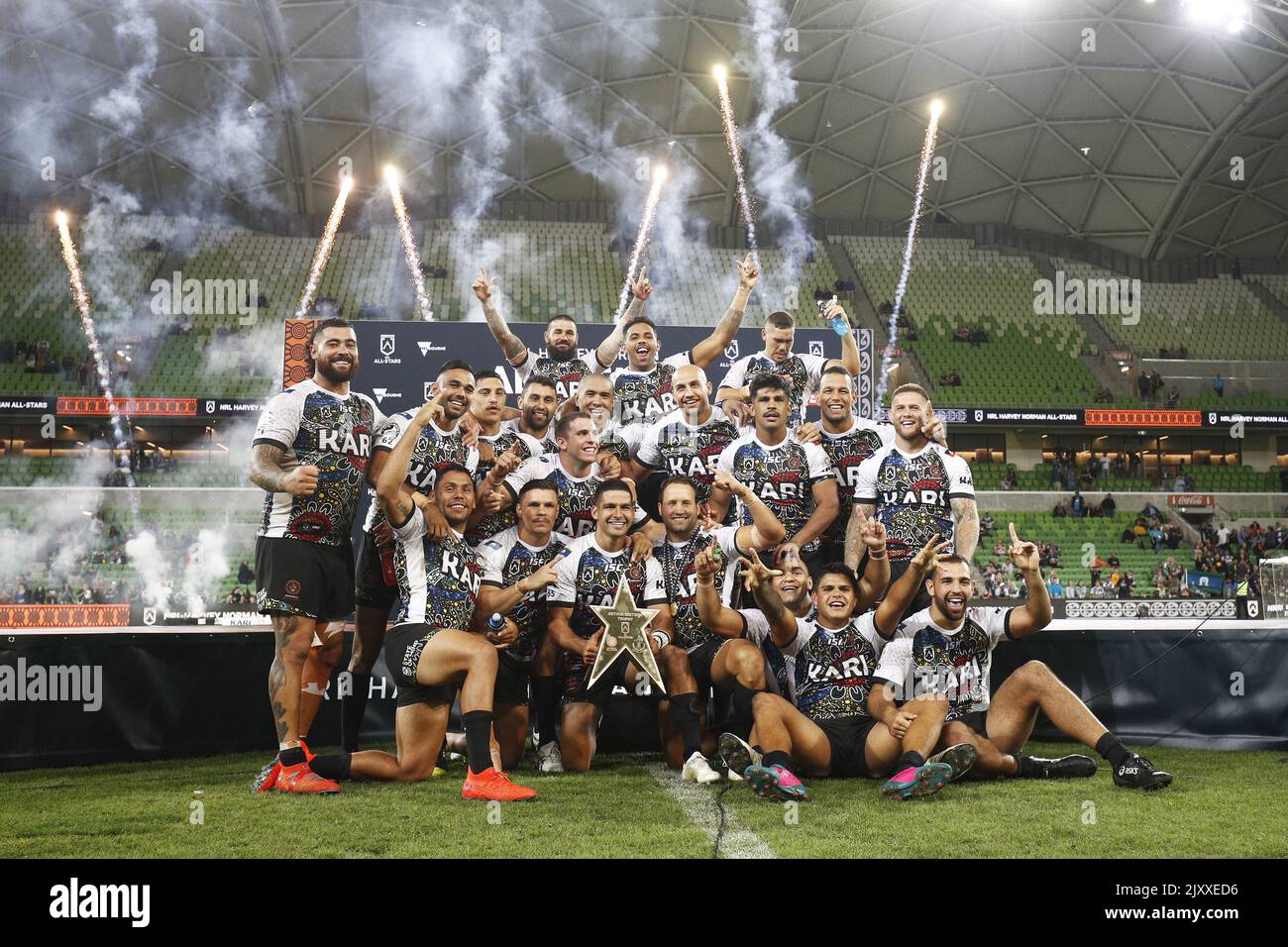 The Indigenous All-Stars pose for a photo with the trophy after winning ...