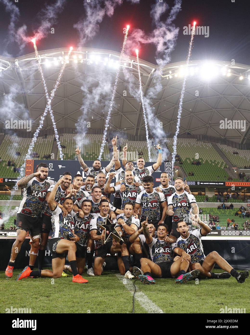 The Indigenous All-Stars pose for a photo with the trophy after winning ...