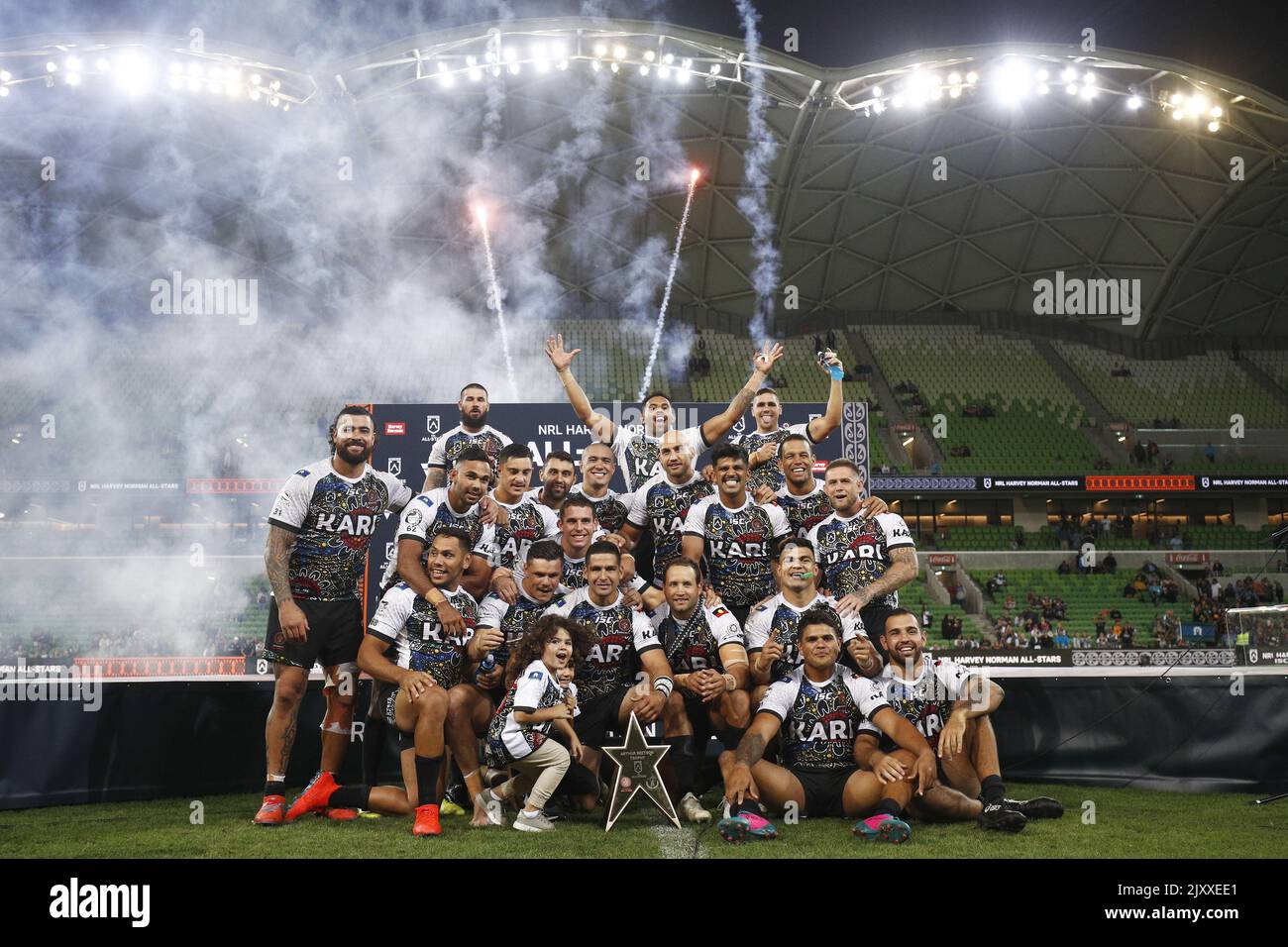 The Indigenous All-Stars pose for a photo with the trophy after winning ...