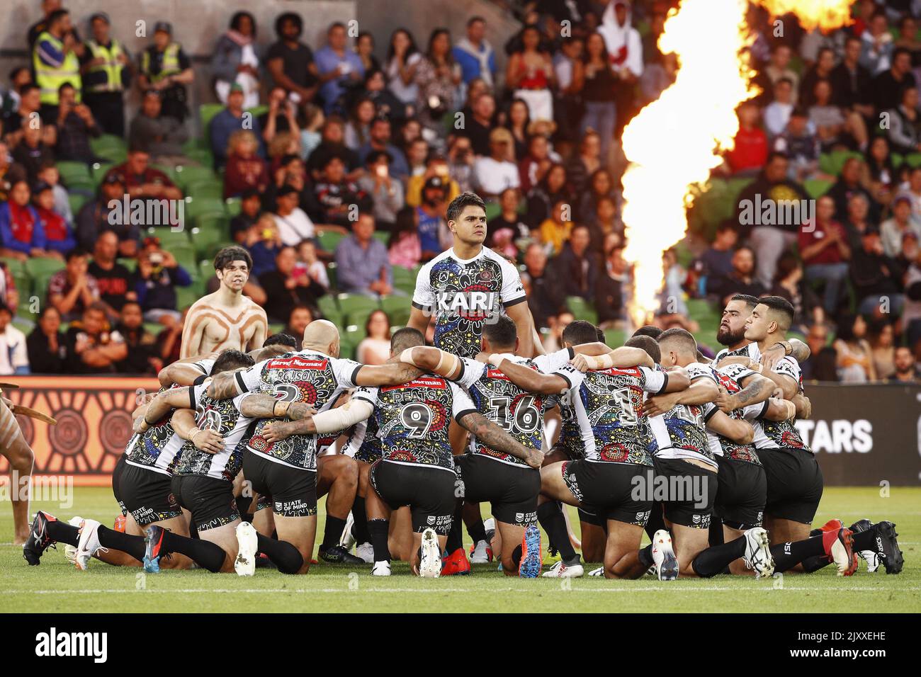 Indigenous players perform a traditional war cry during the NRL ...