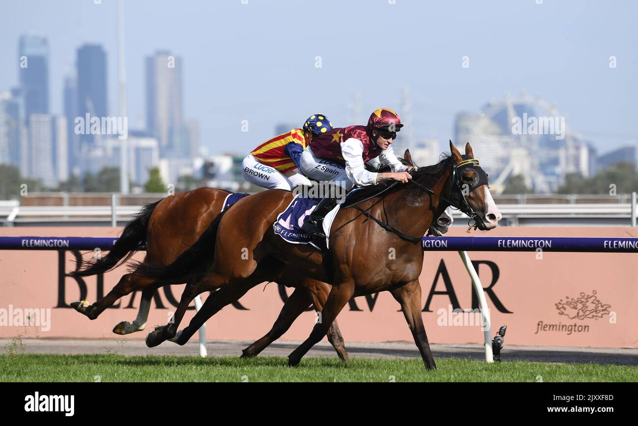 Jockey Zac Spain rides Streets of Avalon (right) to victory in race 9 ...