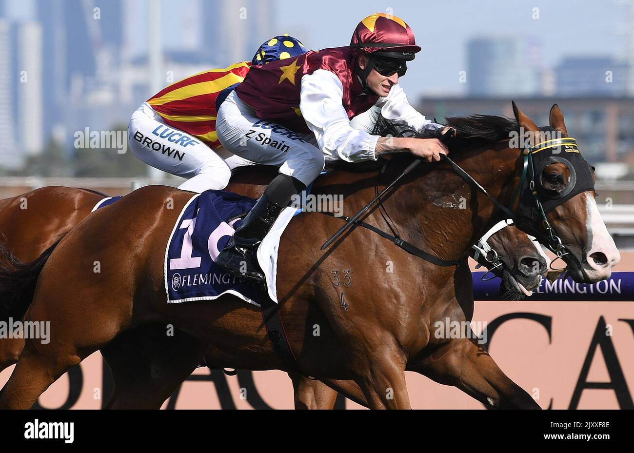 Jockey Zac Spain rides Streets of Avalon (right) to victory in race 9 ...
