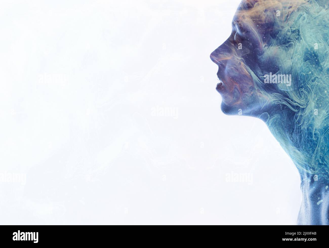 fantasy portrait universe energy blue smoke woman Stock Photo - Alamy