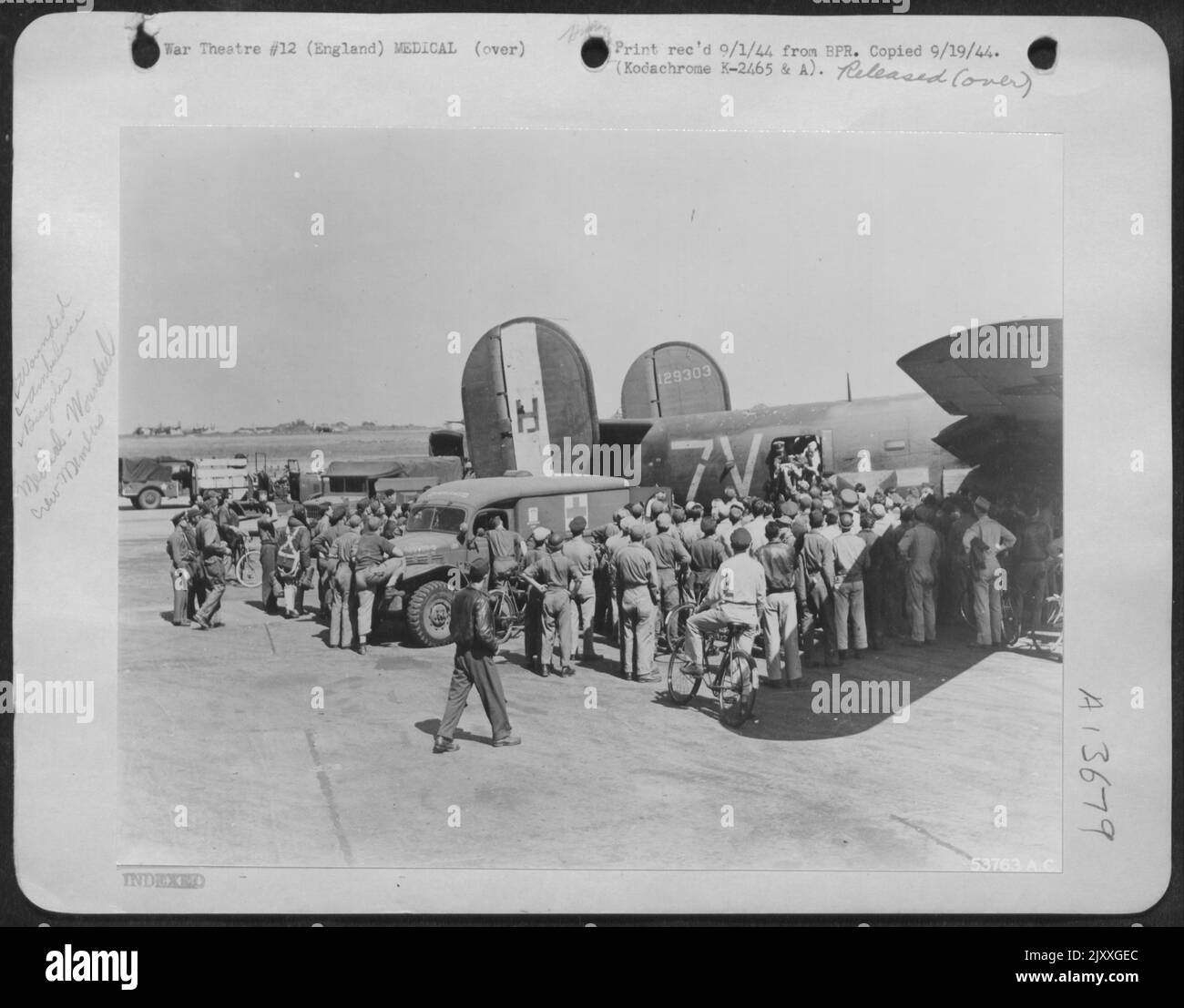 ENGLAND-A Consolidated B-24 Liberator tail gunner, wounded in the leg ...