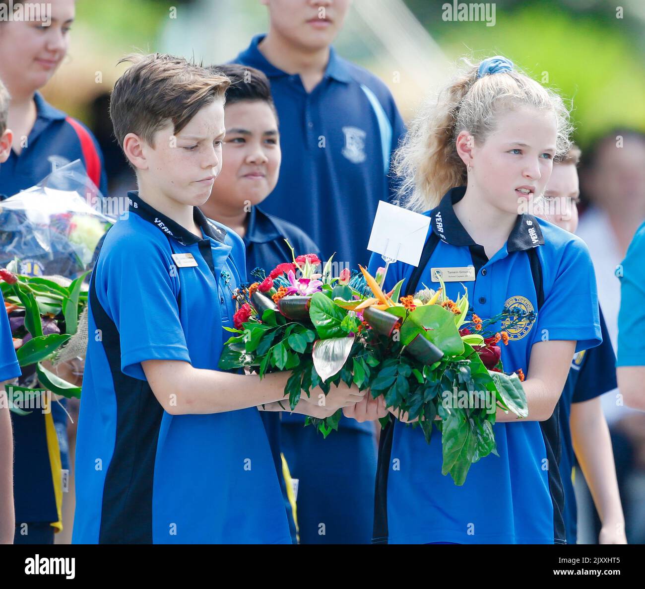 Parap Primary School captains Zach Broadbent and Tamsin Groves carry a ...