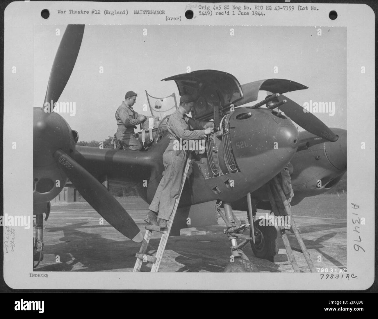 Ground Crewmen Of A Lockheed P-38 Of The 38Th Fighter Squadron, Based ...