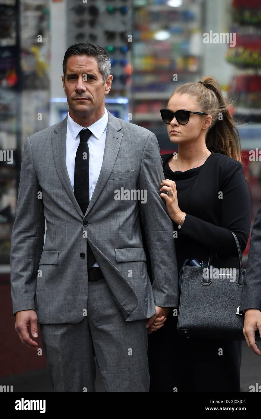 Roman Quaedvlieg (left) and Sarah Jane Chisholm Rogers (centre) arrive ...