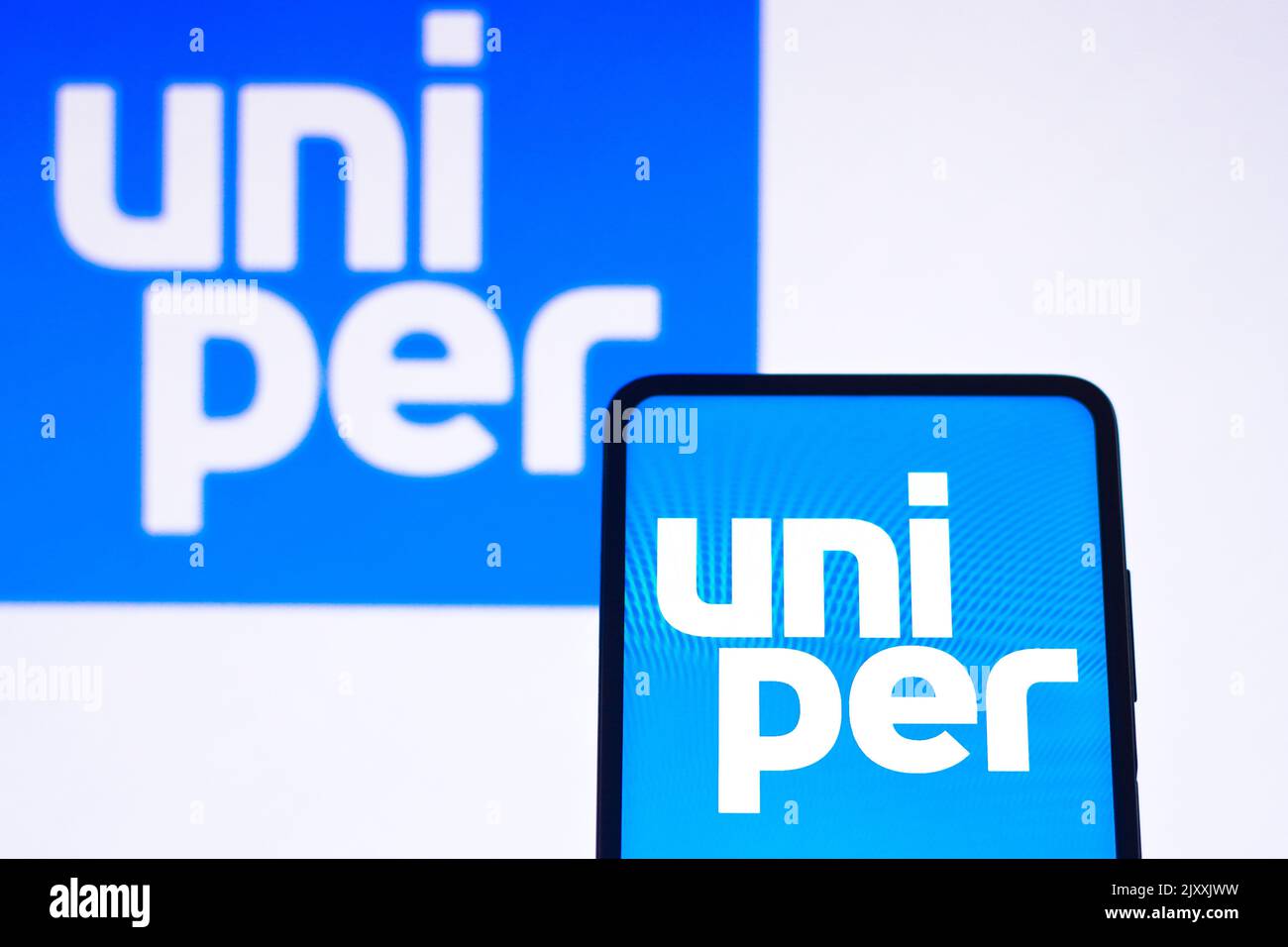 In this photo illustration, the Uniper logo is displayed on a ...