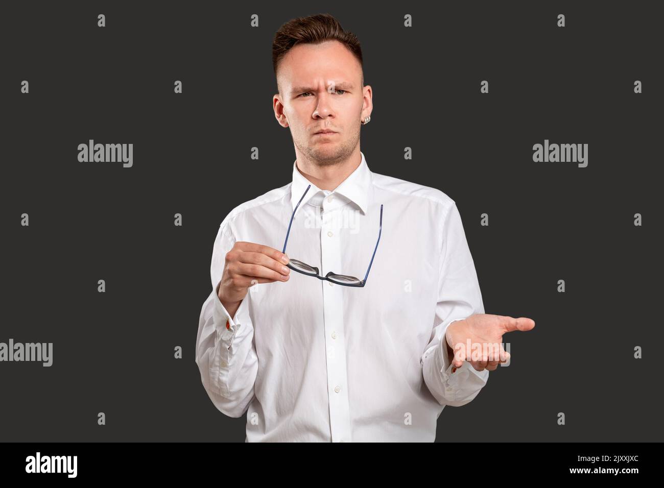 overwhelmed man portrait wtf gesture disturbed Stock Photo - Alamy
