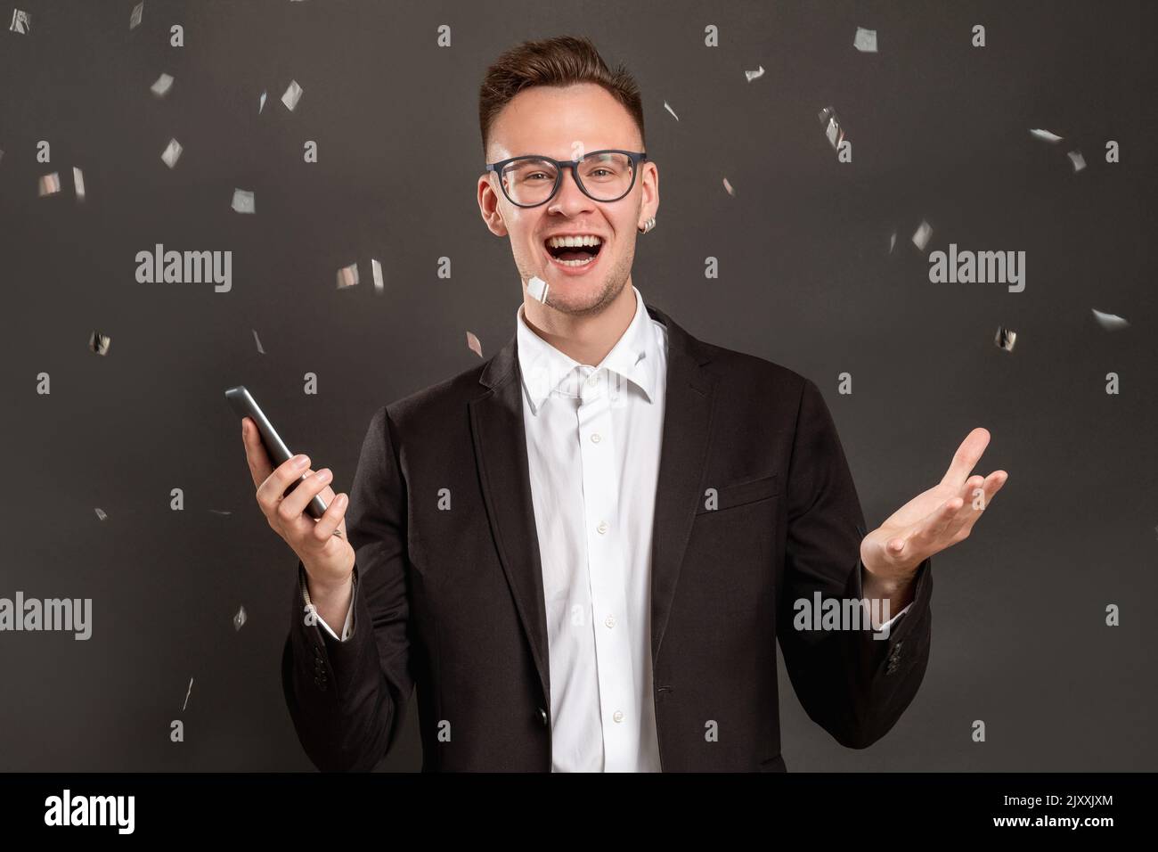 successful career amazed business man confetti Stock Photo - Alamy