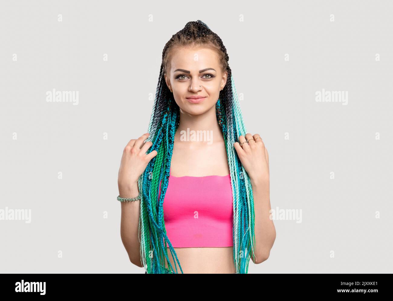woman blue braids colorful hair ethnic hairstyle Stock Photo - Alamy