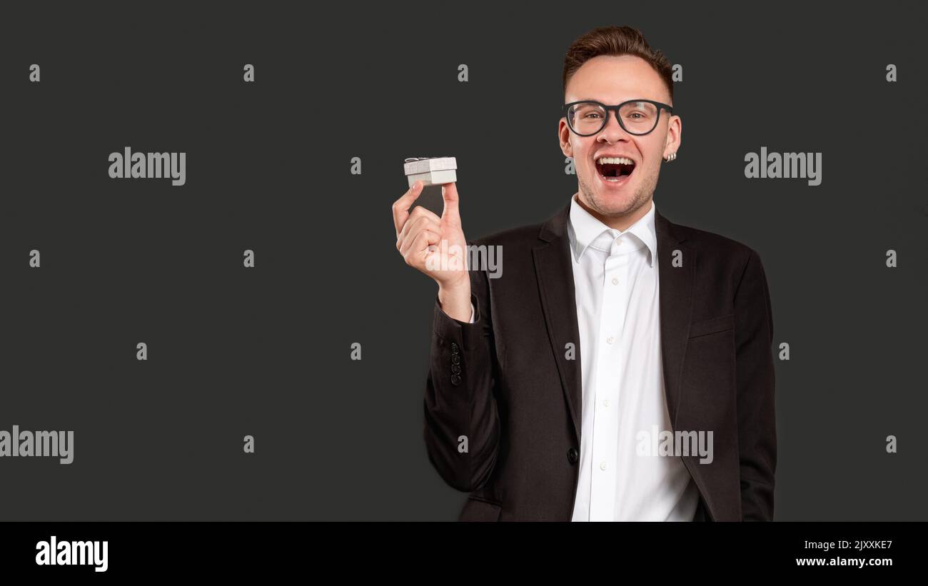 Man holding small gift box hi-res stock photography and images - Alamy