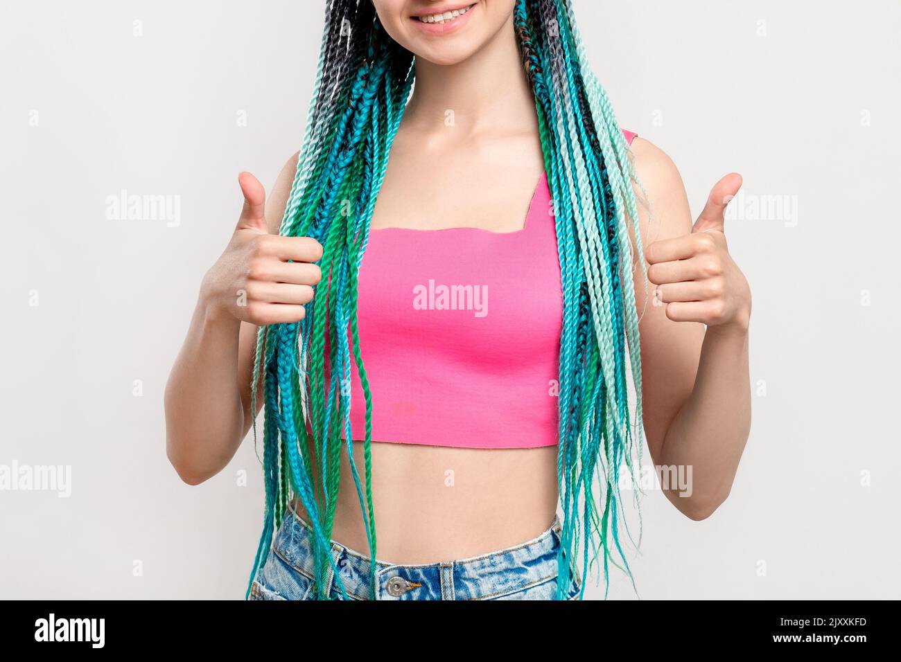 z generation woman blue hair braids like gesture Stock Photo - Alamy