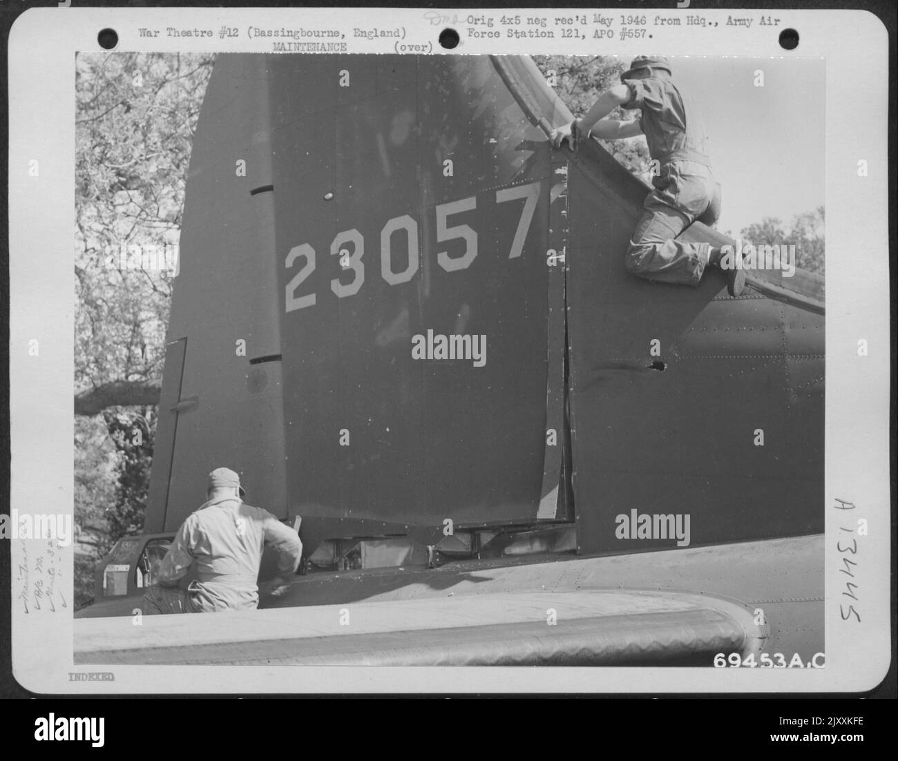 Sheet Metal Workers Repair The Flak-Damaged Tail Of A Boeing B-17 ...
