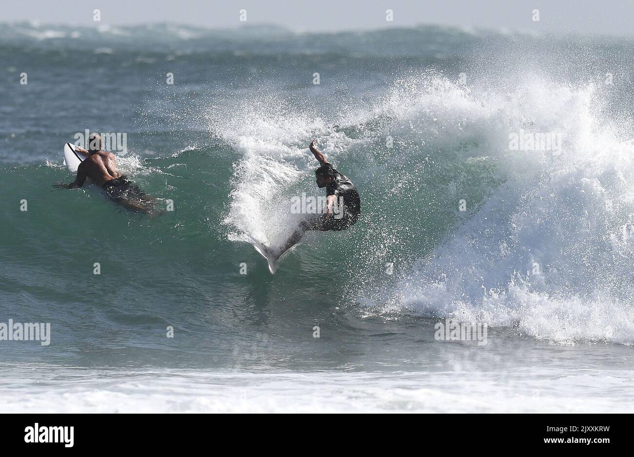 Surfers take advantage of big waves at Noosa on the Sunshine Coast ...