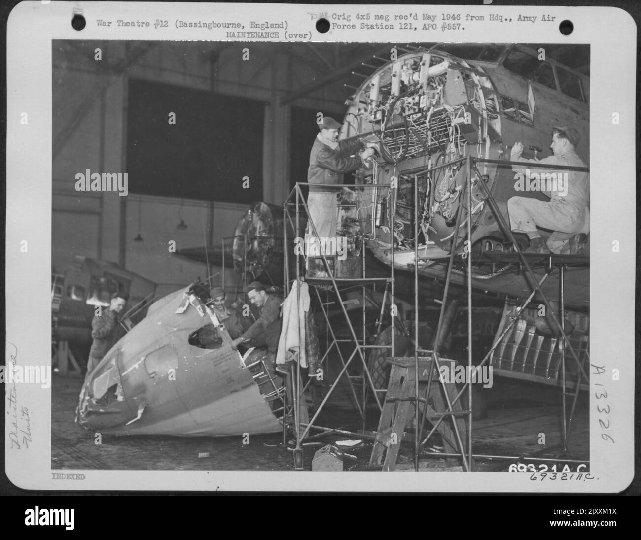Mechanics Repair The Nose On A Boeing B-17 "Flying Fortress" Of The ...