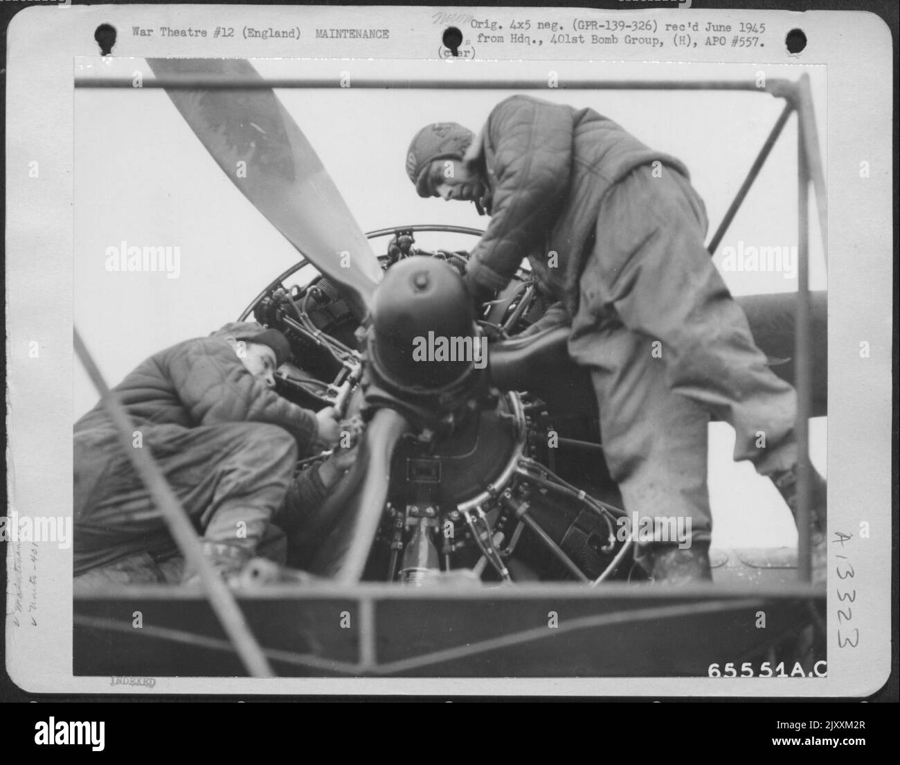 Two Mechanics Repair An Engine Of A 401St Bomb Group Boeing B-17 ...
