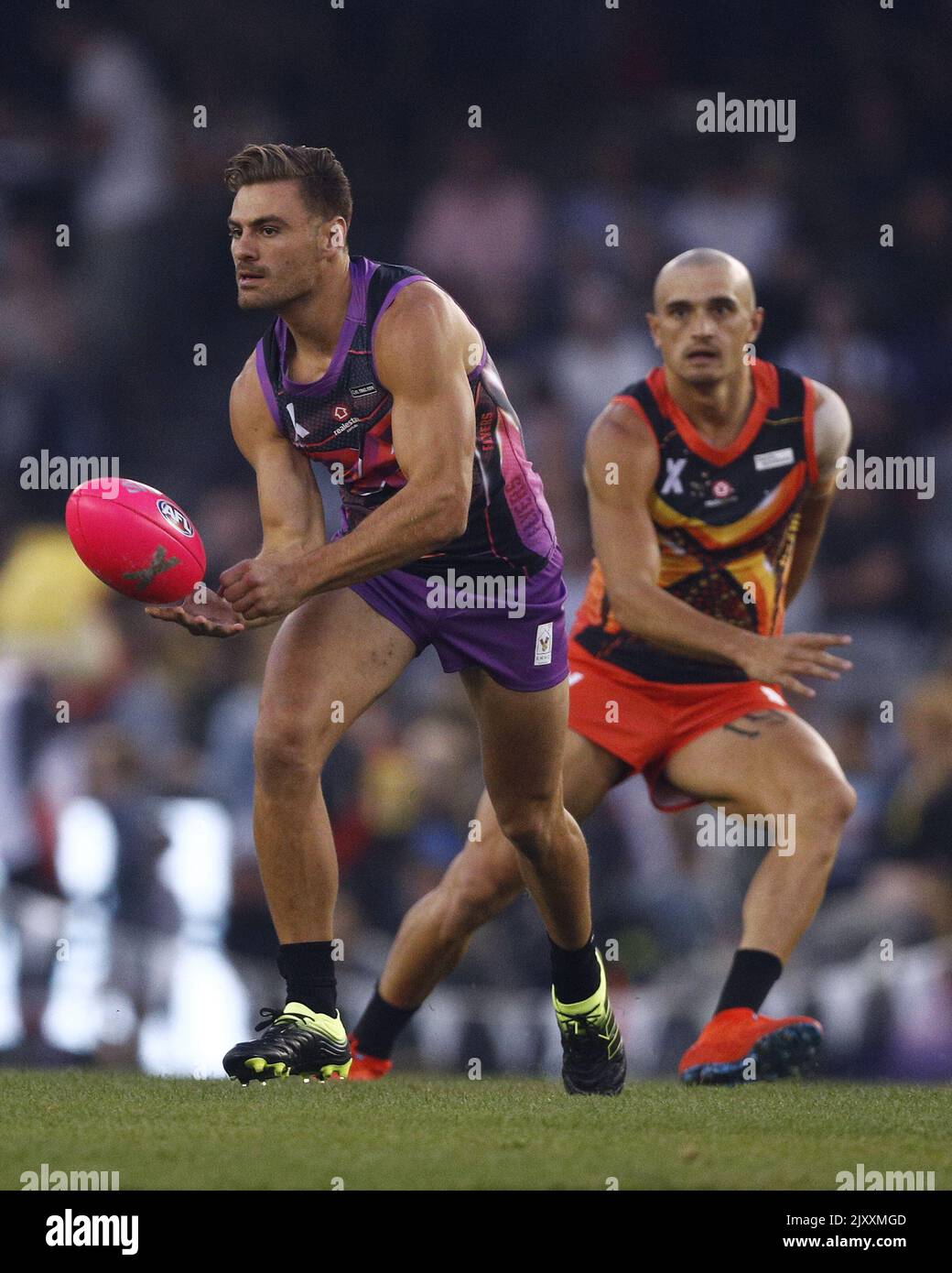 Stephen Coniglio of the Flyers handpasses the ball during the first ...