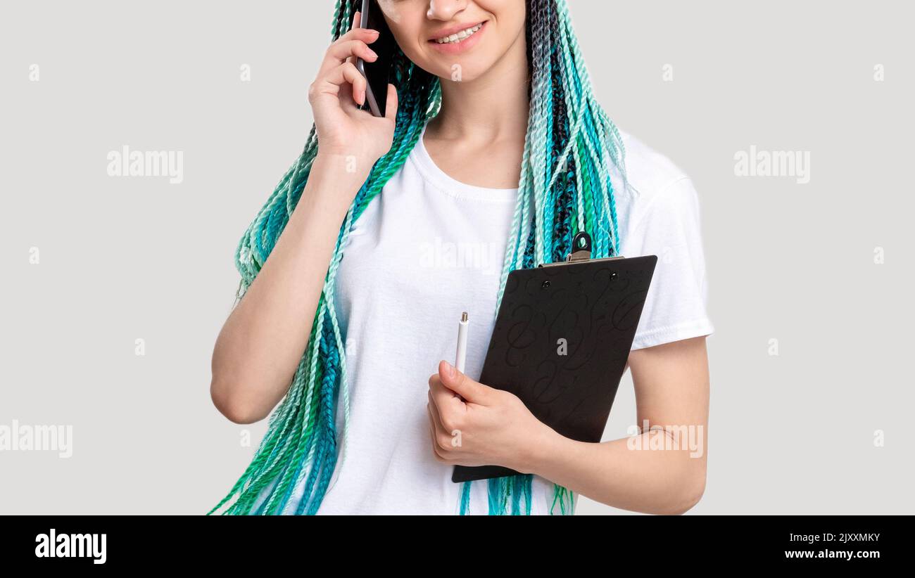 millennial generation woman blue dyed hair braids Stock Photo - Alamy
