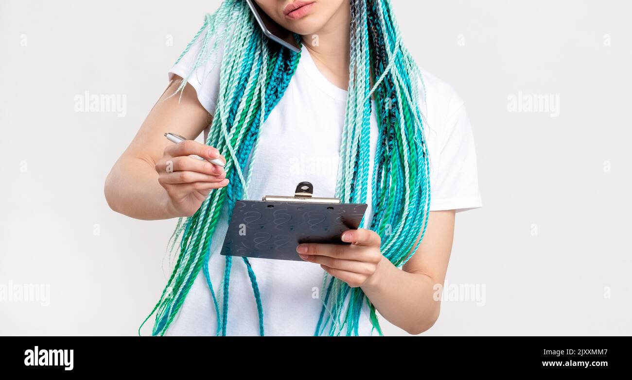 z generation woman bright blue hair braids project Stock Photo - Alamy