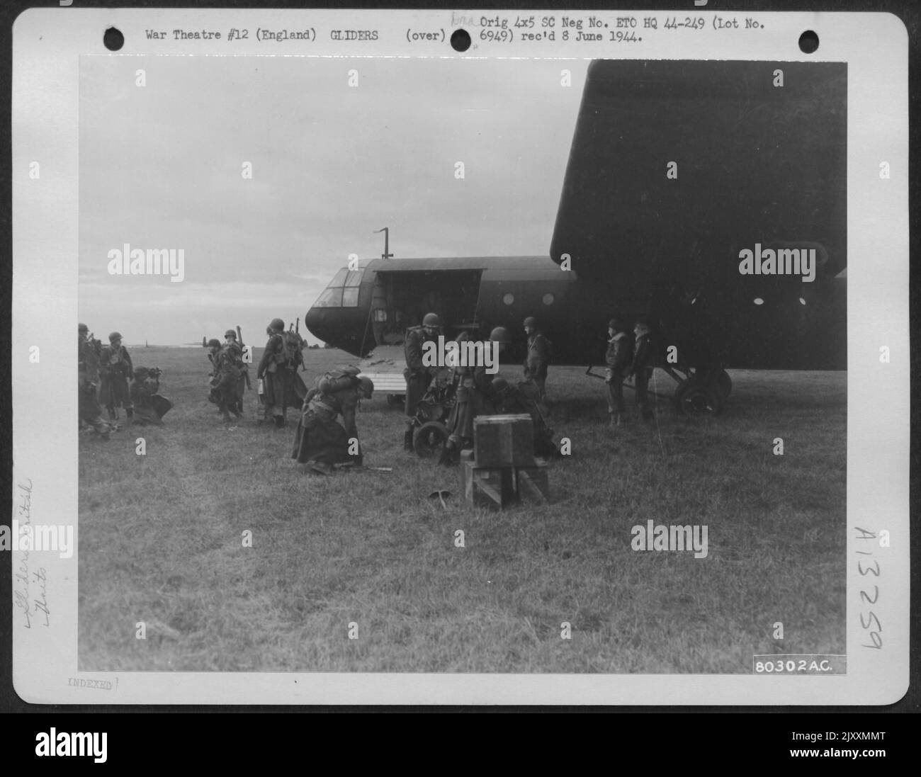 American Airborne Troops Unload Equipment From A Glider During ...