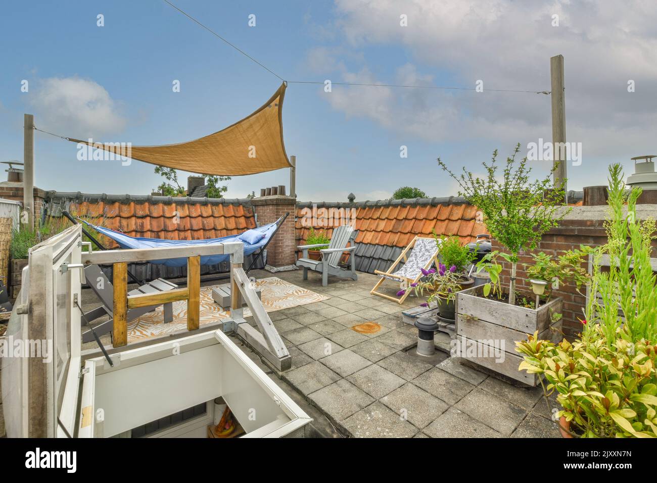 Sitting area on the roof with comfortable furniture around beautiful ...
