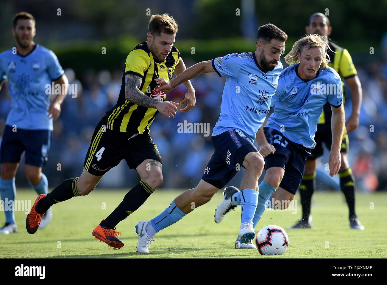 Anthony Caceres of Sydney competes for possession with Mandi Sosa of ...